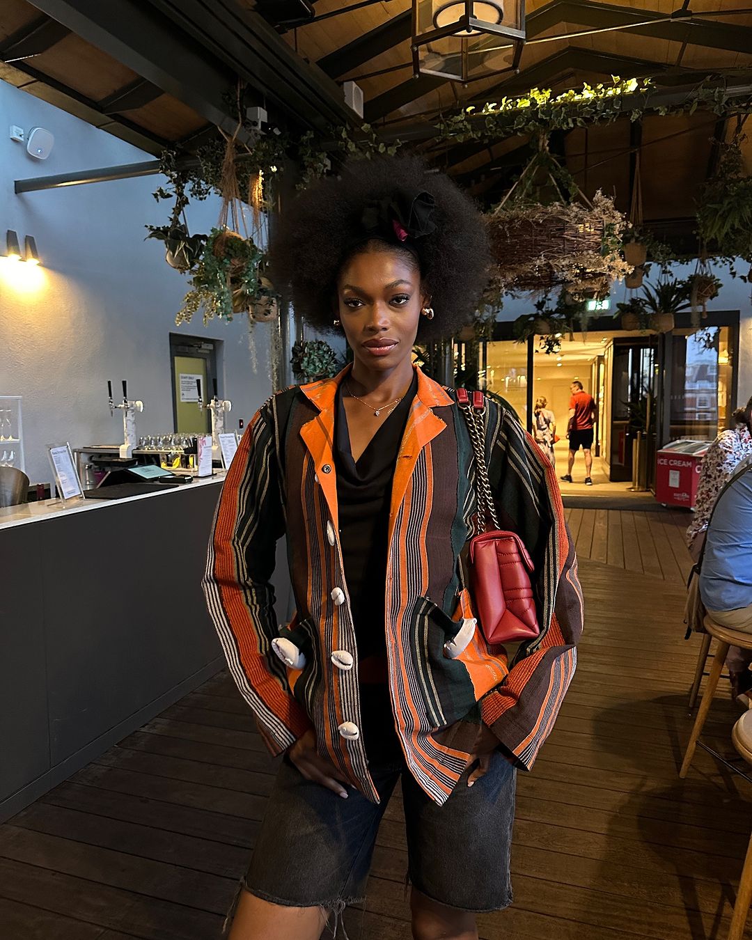Nyekachi Douglas Steps Out In Cowry Jacket and Jorts - LEURR Nigeria